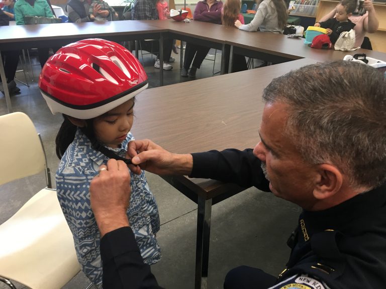 NBPD helps children use bike helmets safely – New Bedford Police Department